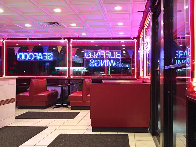 The neon glow transforms this simple eatery into a late-night sanctuary for the hungry and hopeful.