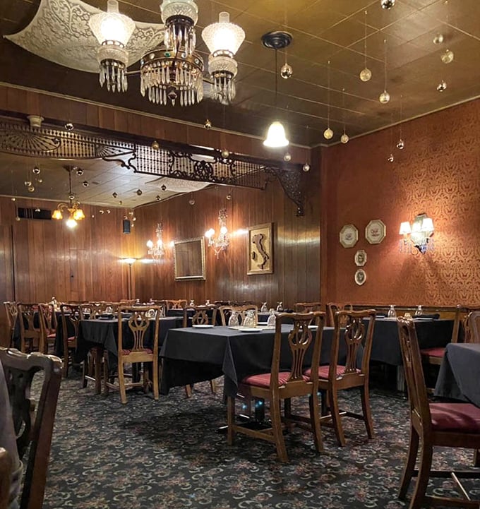 Crystal chandeliers and ornate ironwork overhead – dining at Guarino's feels like being invited to Sunday dinner at a particularly elegant Italian grandmother's home.