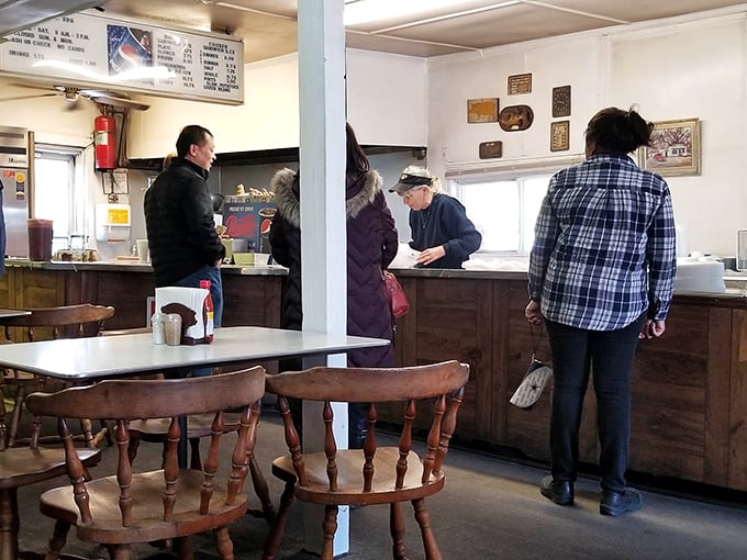 The ordering counter at B's—where barbecue dreams come true. That moment of anticipation is almost as delicious as the food itself.
