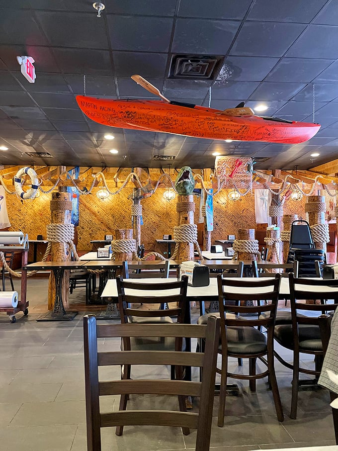 Look up! That's not just décor—it's a canoe hanging from the ceiling, proving that at Storming Crab, even the boats stay to enjoy the food.