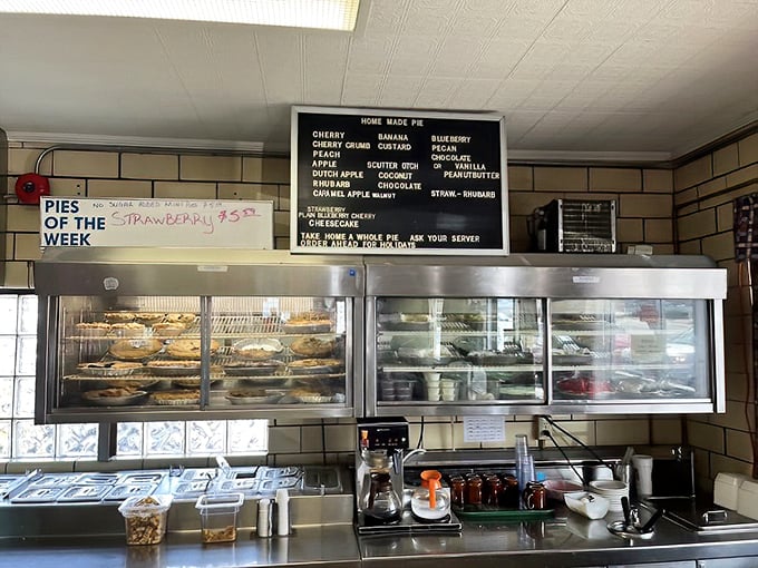 The pie case – where decisions become impossible and diets go to die. Each variety has its devoted followers, like dessert denominations.