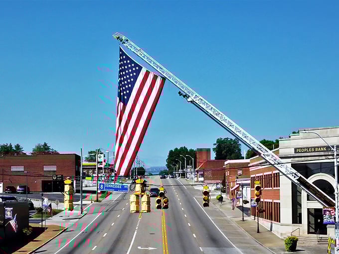 A massive American flag suspended over LaFollette's main street—because small towns do patriotism with both sincerity and flair.