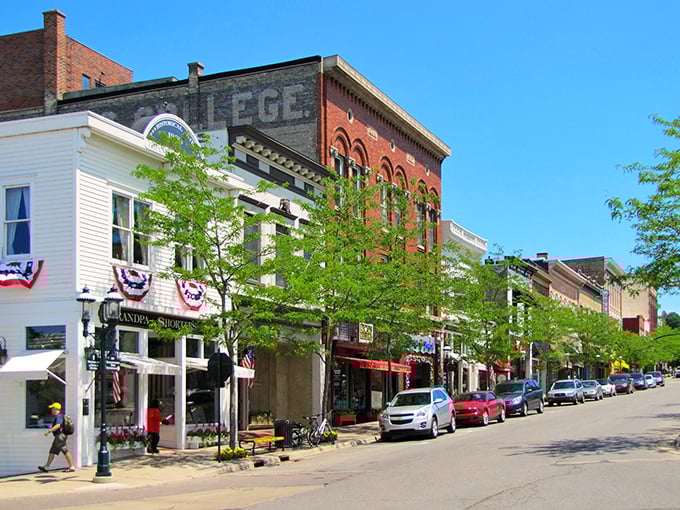 Historic storefronts with American flags flutter in the breeze—Norman Rockwell couldn't have painted a more quintessential Michigan main street.