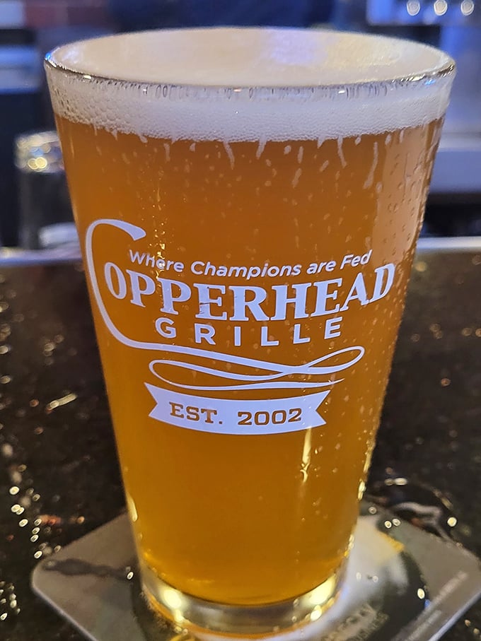 Where Champions are Fed indeed – this golden draft beer practically glows with promise, like liquid sunshine in a perfectly chilled glass.