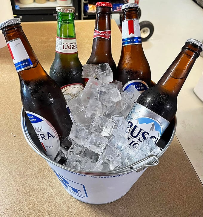 A bucket of icy beer bottles isn't just refreshment—it's a celebration waiting to happen. The perfect runway for your meal to take flight.