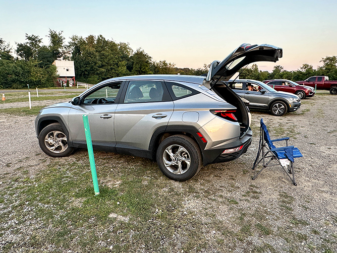Hatchbacks raised like excited eyebrows at the start of a great story—the modern drive-in setup combines comfort with community.