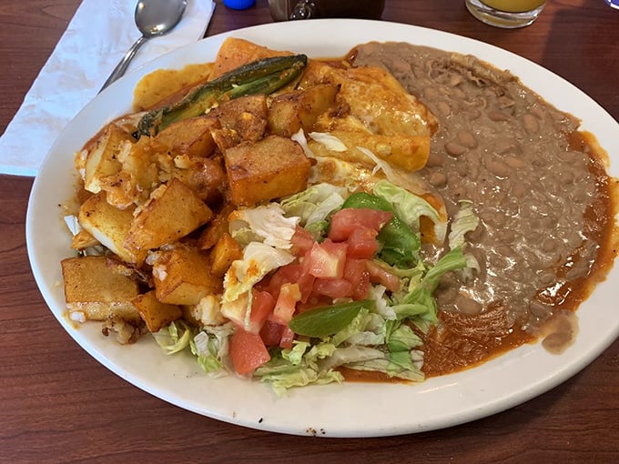Enchiladas Michoacanas with that sunset-orange sauce—like a warm hug from someone who really knows how to cook.