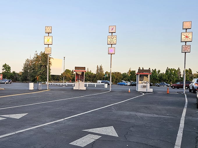 Retro light poles guide you into cinema paradise. These starburst designs are like exclamation points announcing "Movie night ahead!"