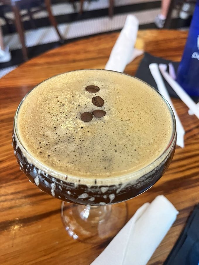 This isn't just coffee with alcohol; it's morning motivation in a fancy glass, topped with coffee beans like little exclamation points of possibility.