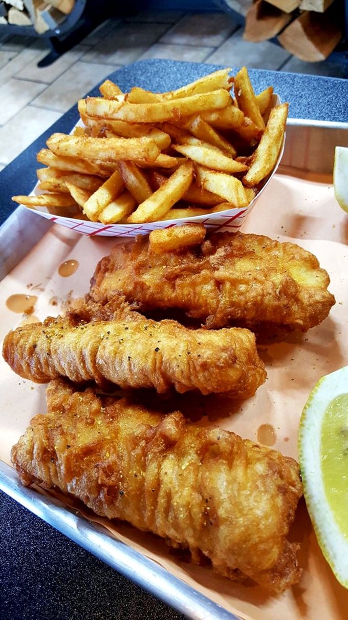 French fries and fish that prove A.B.'s isn't just about barbecue—it's about making everything that touches their kitchen absolutely craveable.
