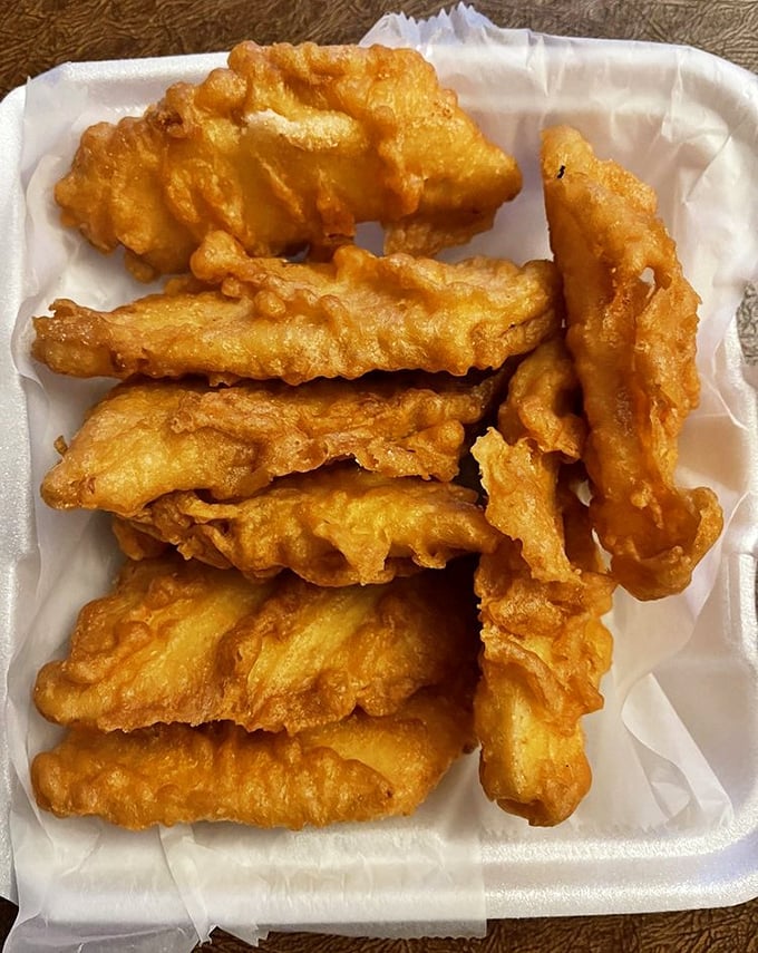 Behold the star of the show: fish fillets with the perfect batter-to-fish ratio, like golden puzzle pieces of deliciousness.