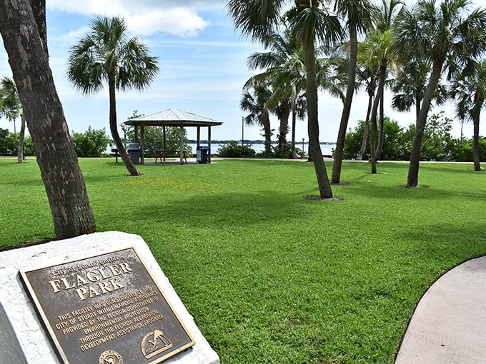 Flagler Park delivers that quintessential Florida experience: palm trees, open grass, and water views that make northerners question their life choices.