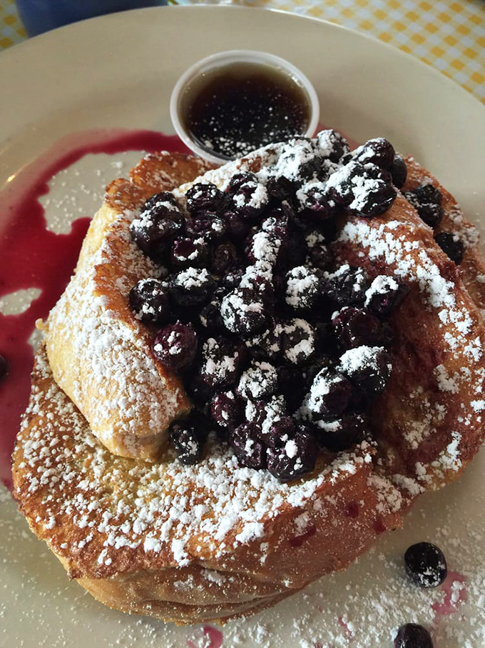 French toast so perfectly golden, it could moonlight as edible sunshine on your breakfast table.
