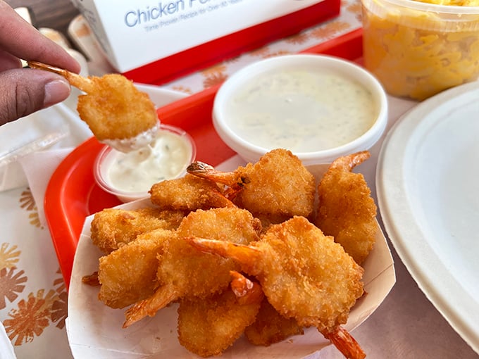 Fried shrimp that snap with freshness despite being miles from any ocean. The dipping sauce isn't an afterthought—it's essential to the experience.