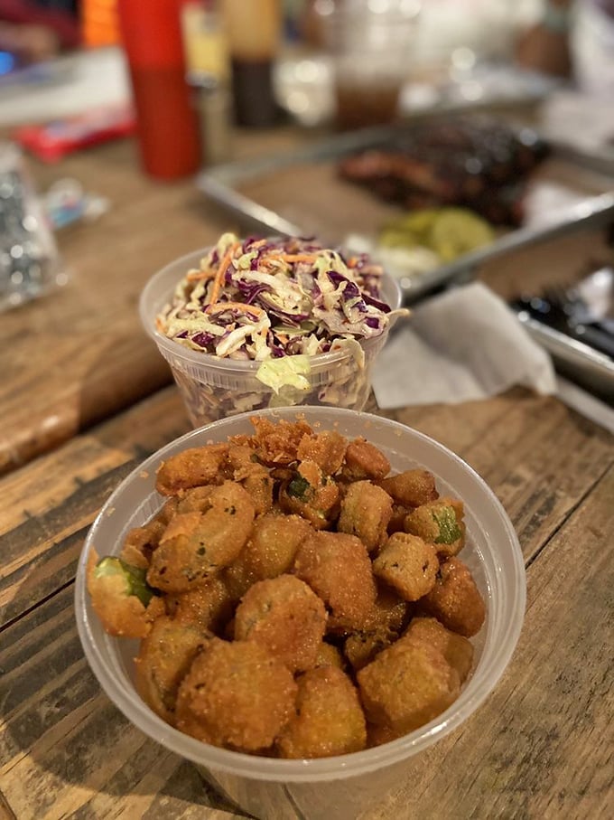 Fried okra and coleslaw: the unsung heroes that cut through the richness. These sides aren't afterthoughts—they're essential companions.
