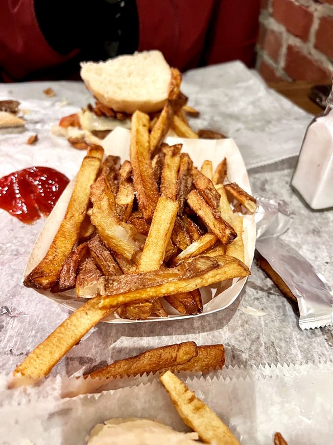 These aren't just fries; they're the co-stars of every sandwich, earning their spotlight one crispy bite at a time.