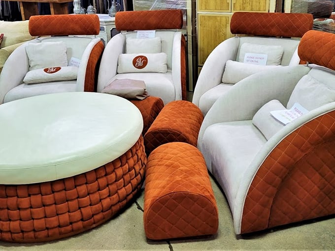 Mid-century meets modern luxury in this striking orange and cream furniture set. Don Draper would approve of these curves—and so would your living room.