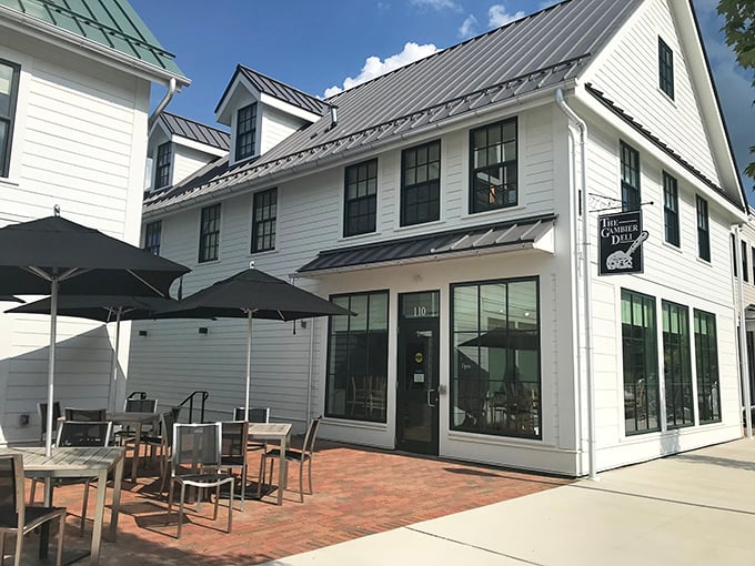 Gambier Deli's crisp white exterior belies the explosion of flavors waiting inside. The outdoor seating area becomes prime real estate on sunny days.