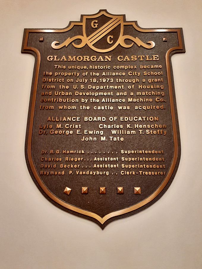 The castle's commemorative plaque reveals its second act as Alliance's most distinguished school administration building—homework has never been so grand!