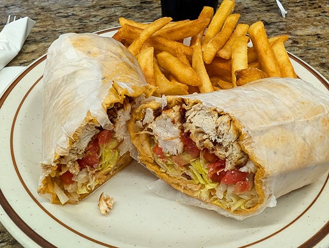 This chicken wrap with fries isn't trying to win beauty contests—it's too busy delivering straightforward satisfaction that puts fancy food to shame.