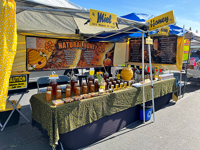 Swap meet vendors bring their A-game with displays like this honey stand—proving the drive-in's double life offers sweet deals by day.