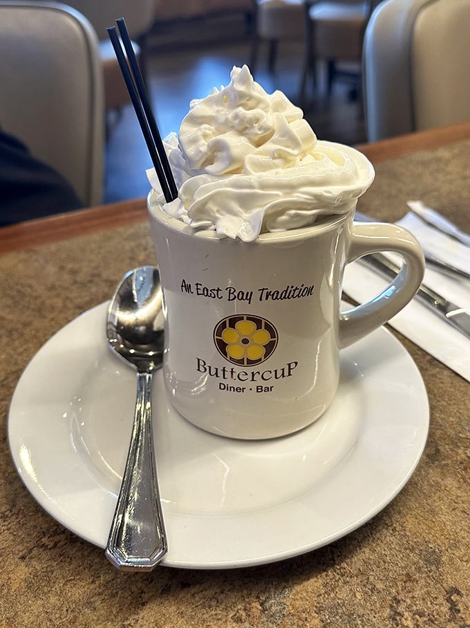 Their hot chocolate isn't just a beverage—it's a towering monument to whipped cream excess that makes adult problems temporarily disappear.