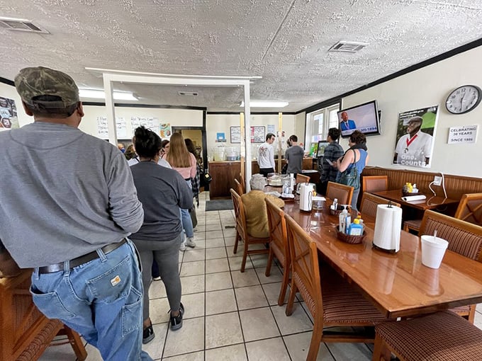 The line forms for a reason. Locals and visitors alike queue up for their turn at Southern food nirvana.
