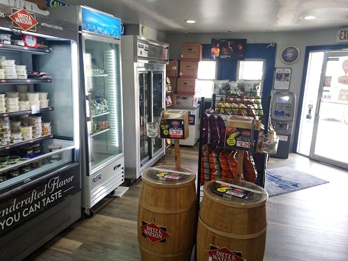 The refrigerator section isn't just stocked—it's a treasure chest of sandwich possibilities guarded by wooden barrels like delicious sentries.