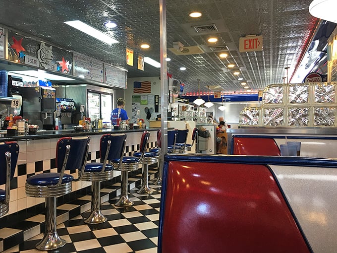 Counter culture at its finest—where blue vinyl stools invite solo diners to perch and watch short-order magic unfold before their eyes.