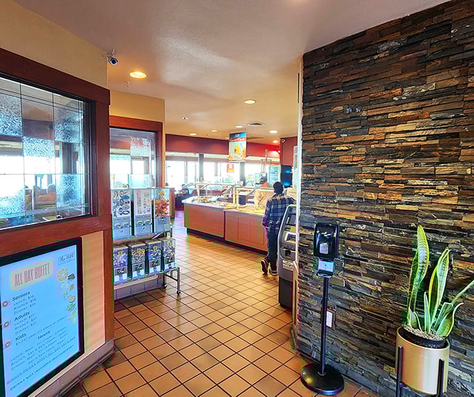 The entrance showcases stone walls and buffet stations – like the gateway to a food fantasy you've had since childhood.