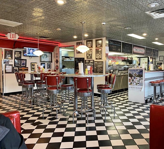 Where chrome meets comfort—the classic diner interior makes you half-expect to see the Fonz walk in and hit the jukebox.