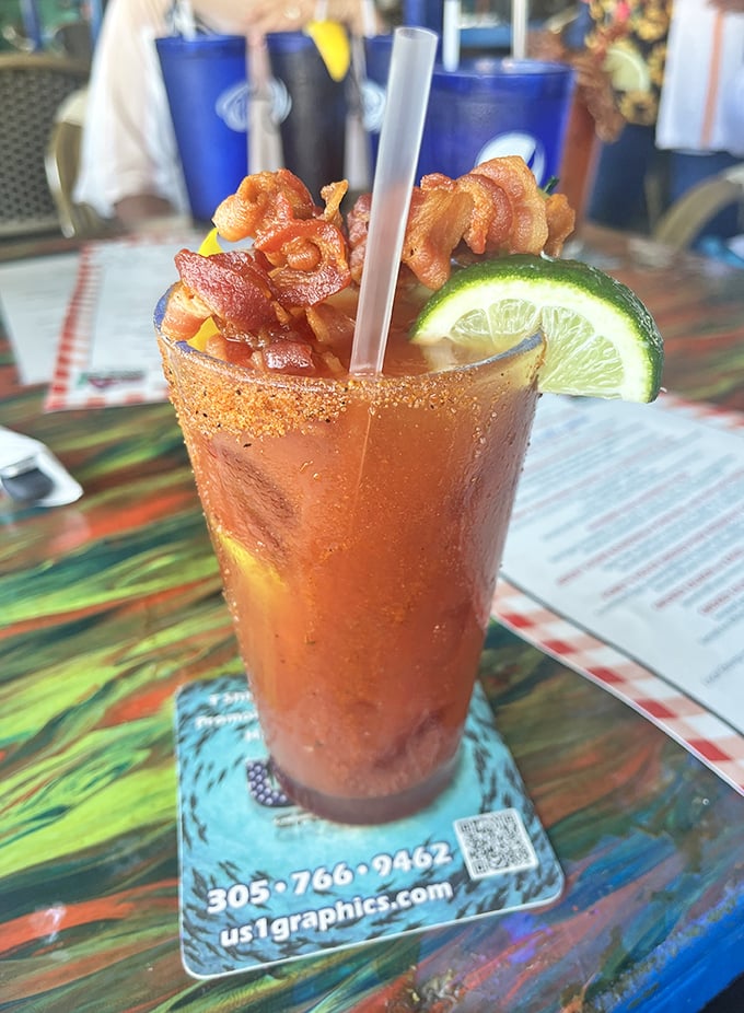 A Bloody Mary that doubles as both cocktail and appetizer. That bacon garnish isn't just showing off—it's multitasking.