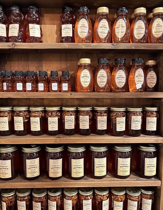 Liquid gold in bottles – local honey in various shades of amber that would make bees themselves stop by for quality control inspections.