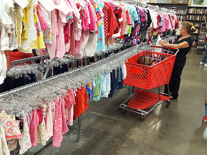 The children's clothing section—a rainbow of tiny garments where parents can outfit growing kids without breaking the bank.