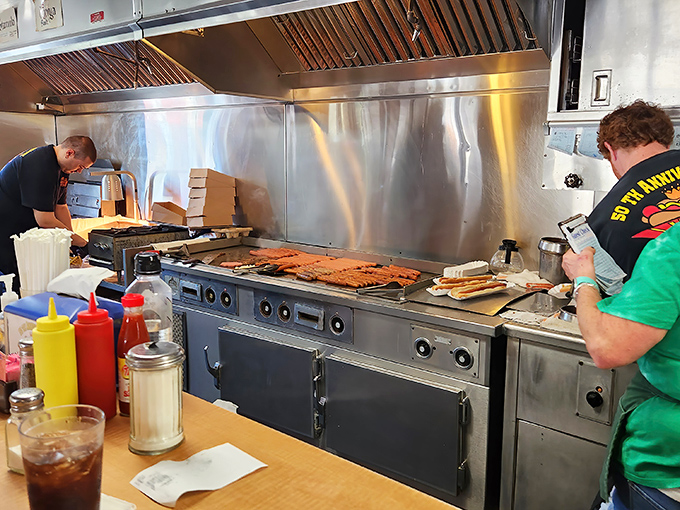 Where the magic happens – that flat-top grill has probably seen more action than a Hollywood stuntman. Seasoned to perfection.