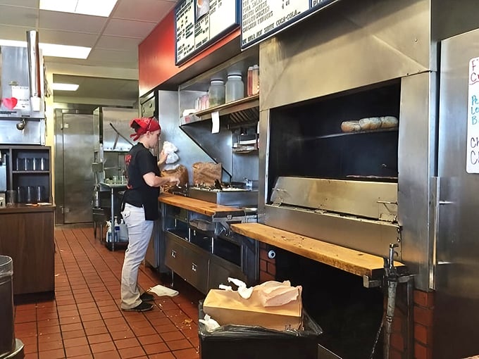 Where the magic happens—an actual charcoal grill that laughs in the face of modern cooking technology while creating flavors that can't be replicated.