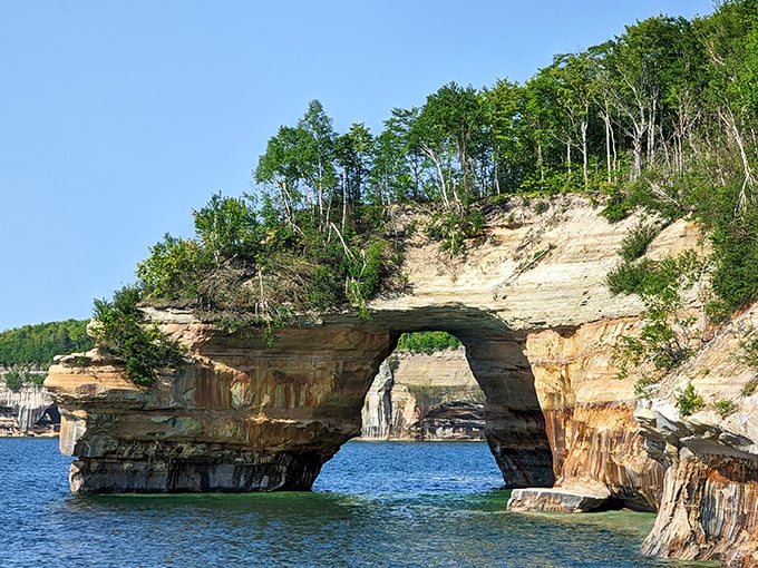 The famous Pictured Rocks arch—nature's answer to man-made monuments, carved by nothing but water and patience.