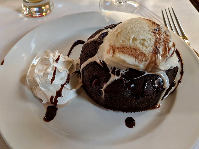 Chocolate lava cake: where molten decadence meets cold ice cream in a temperature tango that makes physics delicious. Resistance is futile.