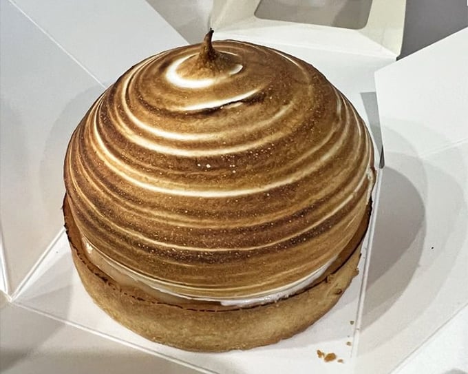 That lemon tart is sunshine on a plate, the kind of dessert that makes you close your eyes and momentarily forget about your inbox.
