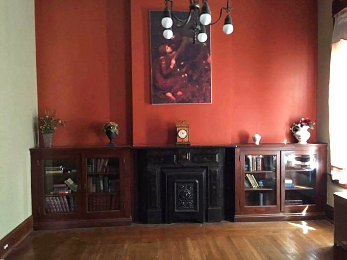 The library's rich wood and red walls create the perfect backdrop for ghost stories—or creating a few new ones of your own.