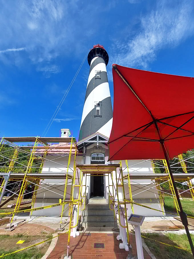 Even lighthouses need a spa day occasionally – scaffolding surrounds the keeper's house during preservation work on this historic treasure.
