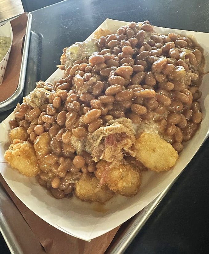 Loaded tots that defy gravity and good sense. A mountain of beans, meat, and tots that says, "Diet? What diet? We're living today!"