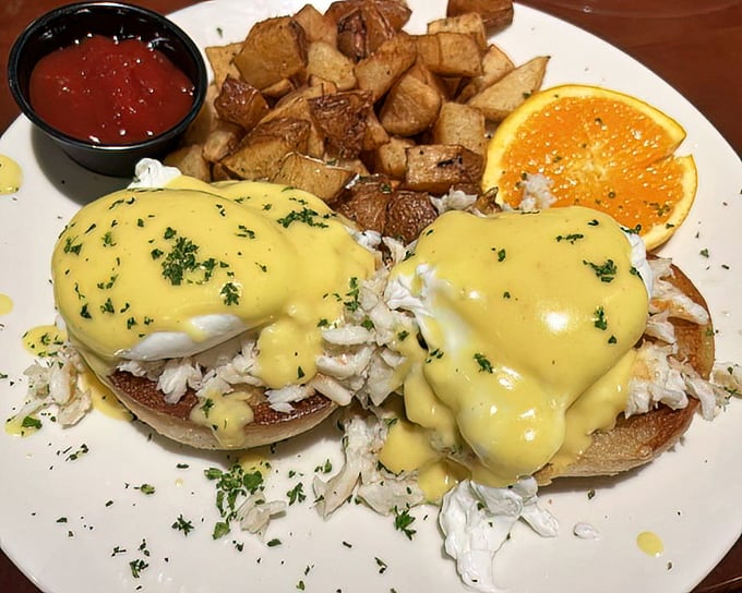 Crab Benedict that makes breakfast feel like a special occasion. Golden hollandaise cascades over delicate seafood—morning transformed.