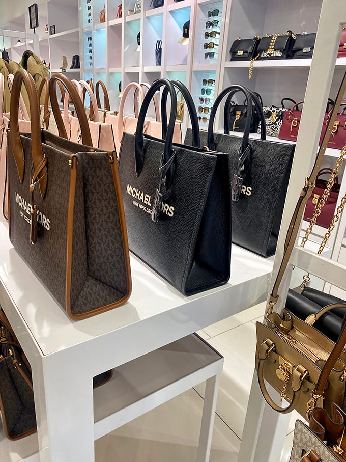 Michael Kors handbags stand at attention like fashionable soldiers, ready to transform ordinary outfits into "I've got my life together" ensembles.