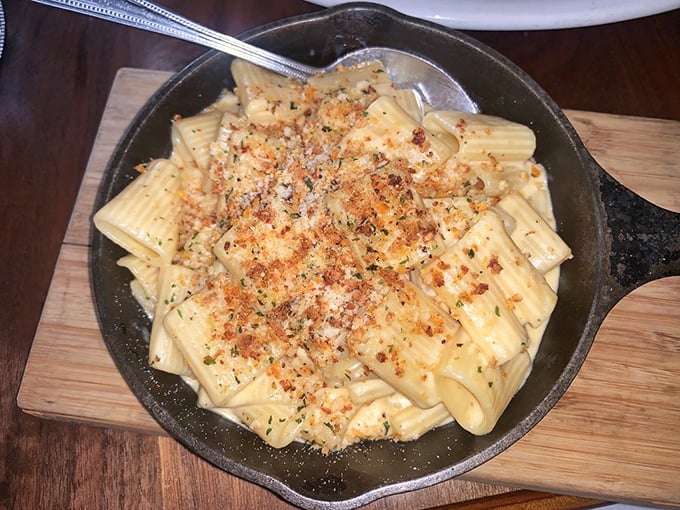 Mac and cheese in a cast iron skillet—because sometimes the universe knows exactly what your soul needs before you do.