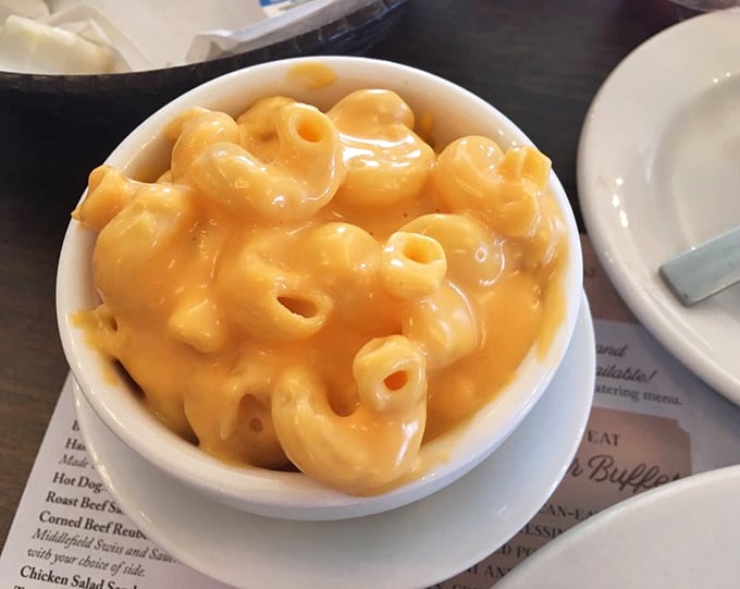 Mac and cheese that achieves that perfect molten-gold consistency – childhood nostalgia upgraded to gourmet status.
