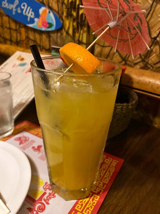 A proper Mai Tai comes with its own tiny umbrella—it's the law. This sunshine-in-a-glass is deceptively potent, like a cheerful friend who's secretly a ninja.