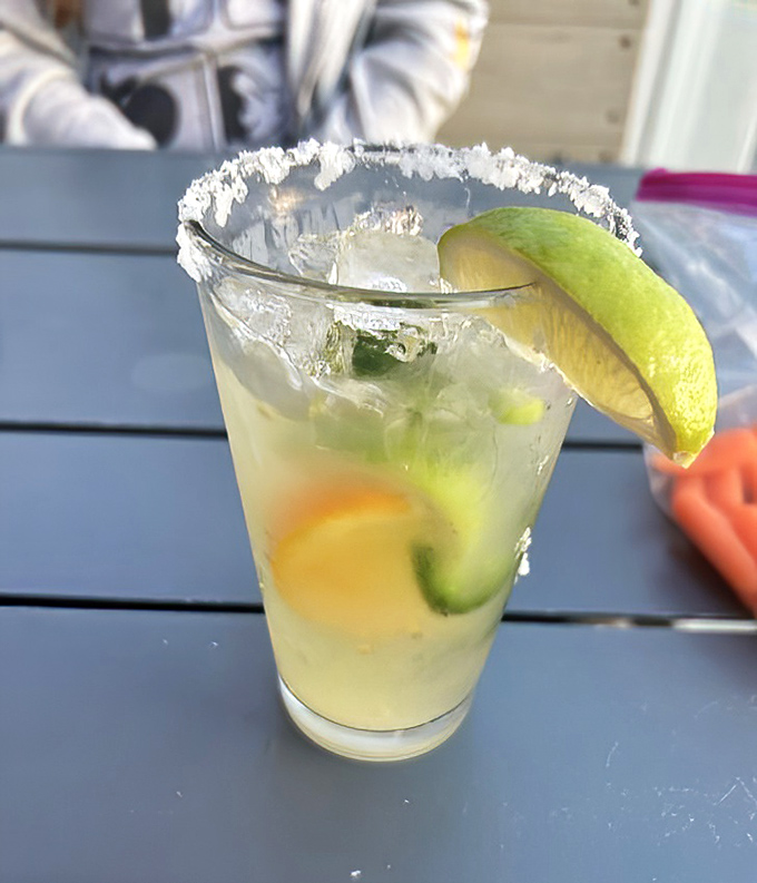 A margarita that whispers "beach day" louder than Jimmy Buffett's entire discography – salt rim mandatory, worries optional.