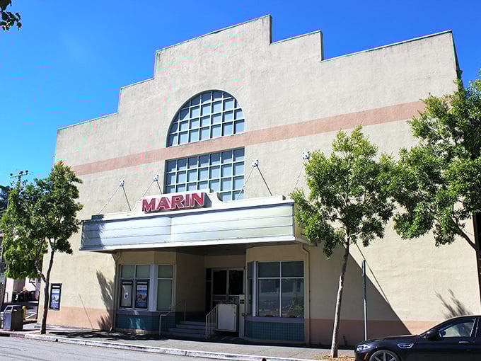 The Marin Theatre's Art Deco façade stands as a cultural landmark, its vintage marquee promising entertainment that competes with the drama of Sausalito's natural setting.