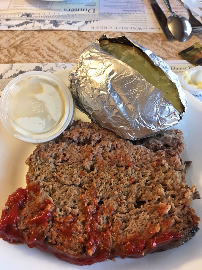 Meatloaf and baked potato—the Batman and Robin of comfort food, fighting hunger crimes with homestyle heroism and a side of sour cream.